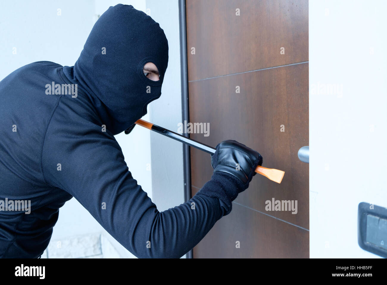 Breaking door hi-res stock photography and images - Alamy