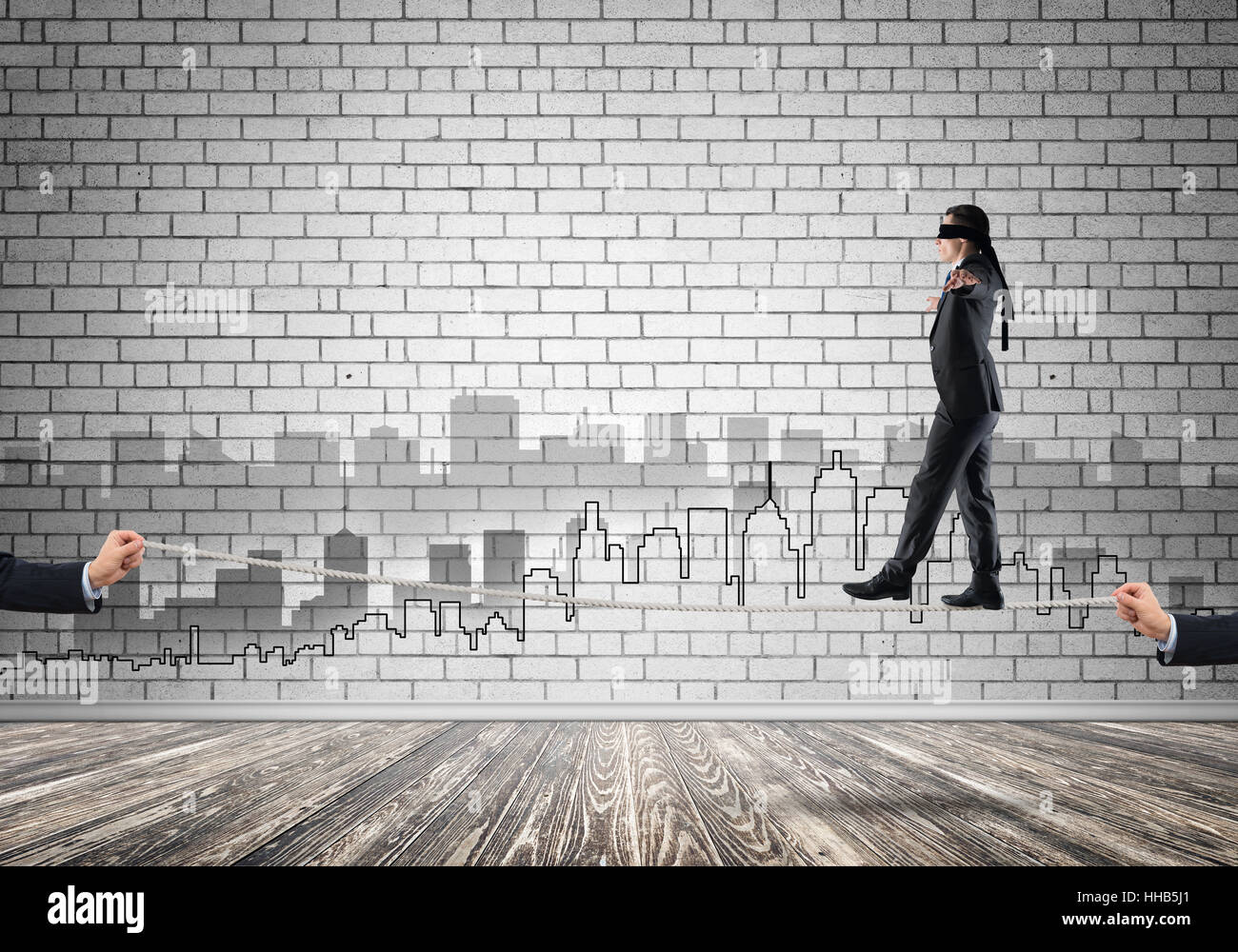 Business concept of risk support and assistance with man balancing on ...