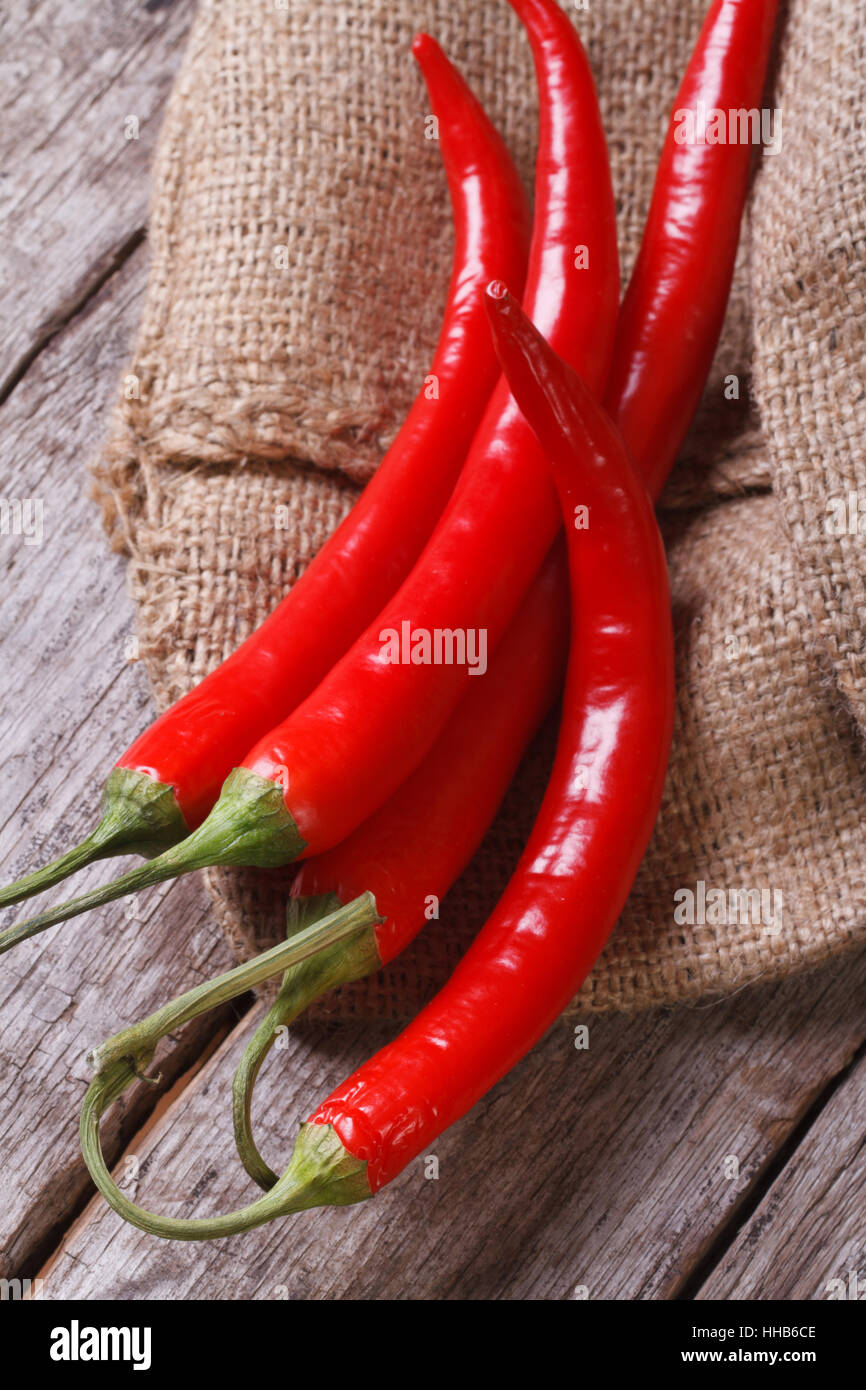 red chili pepper on a sacking vertical. top view Stock Photo - Alamy