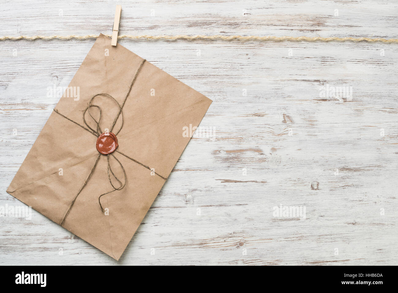 Mail envelope on rope Stock Photo - Alamy
