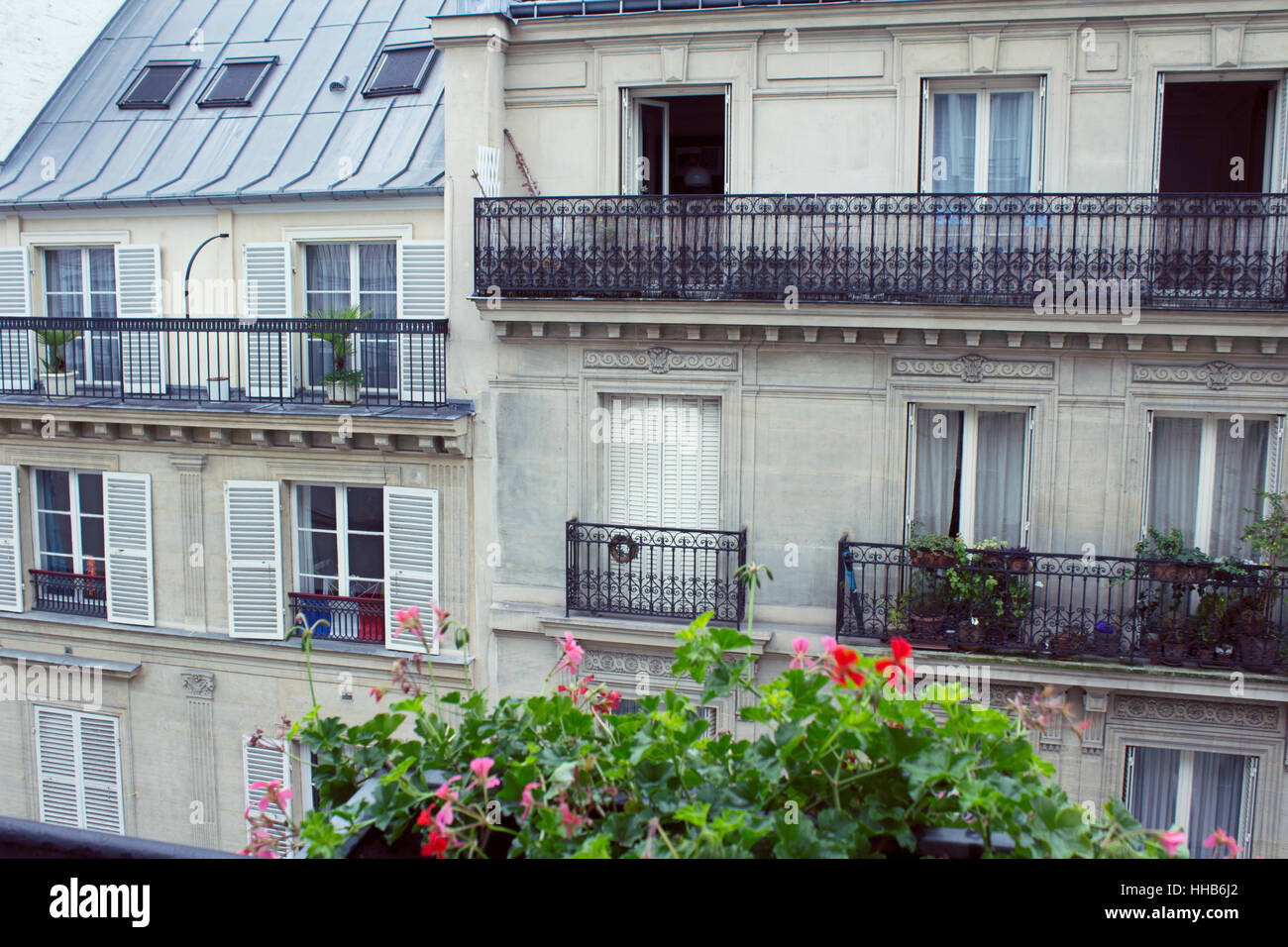 Typical facade of Parisian Haussmann buildings: detail of the balcony ...