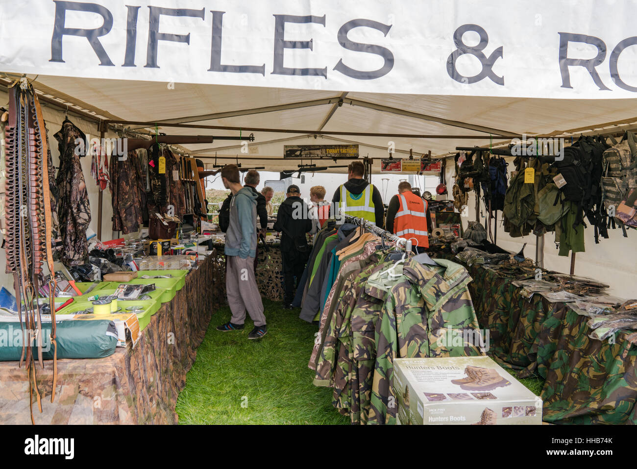Customers browse in a country sports stall at Anglesey Show Stock Photo ...