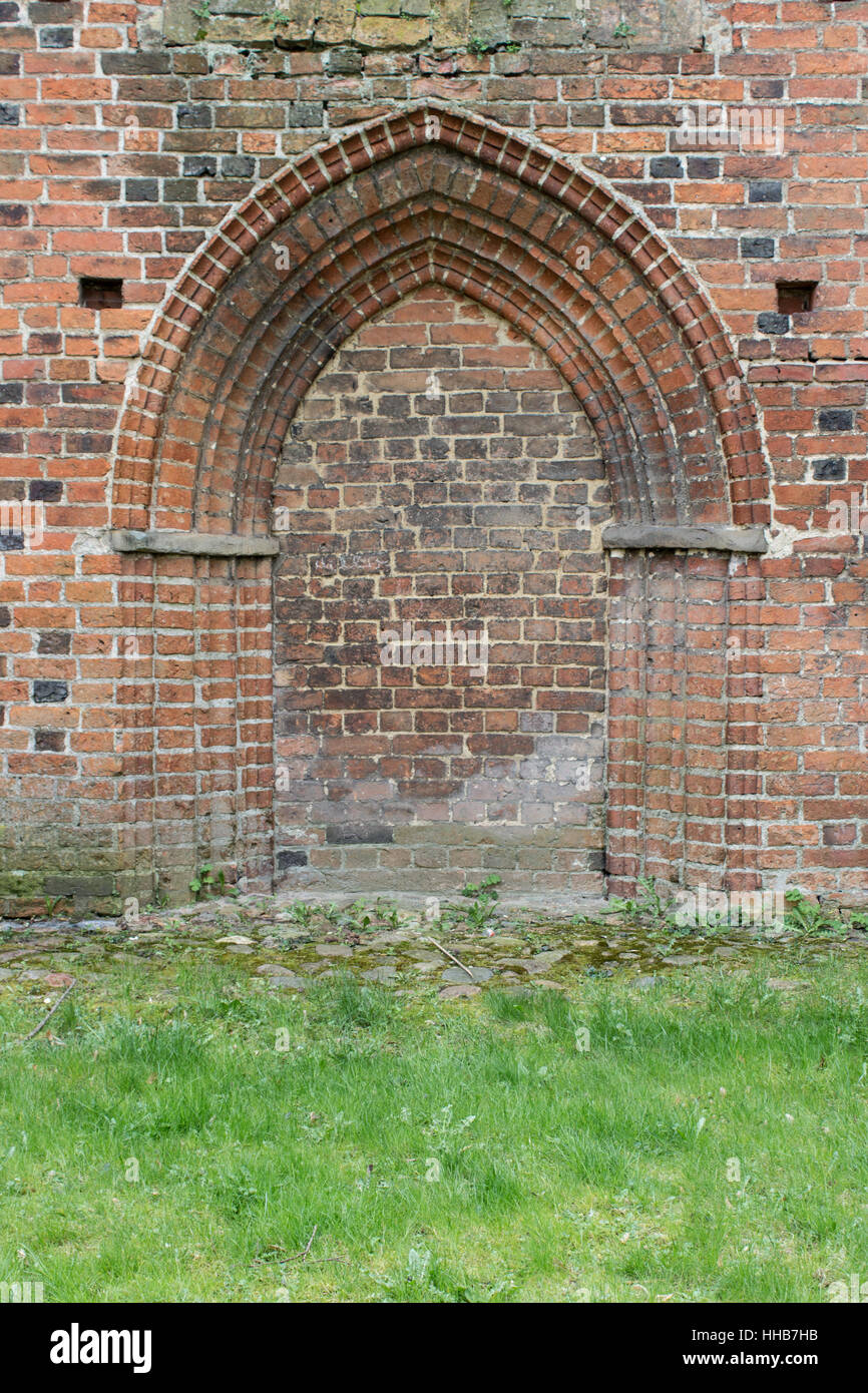 Wall with gothic pointed arch Stock Photo - Alamy