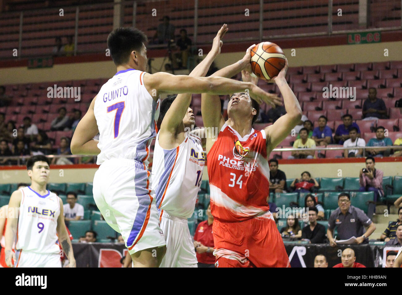 Pasay City, Philippines. 18th Jan, 2017. Mark Miranda of Phoenix tries ...