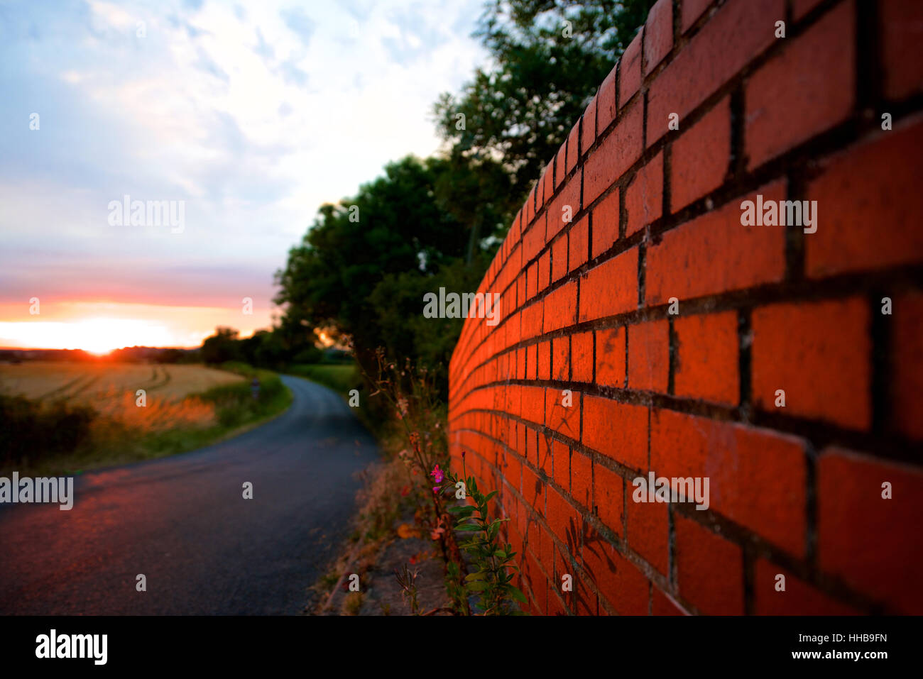Open Road over Bridge at sunset Stock Photo - Alamy