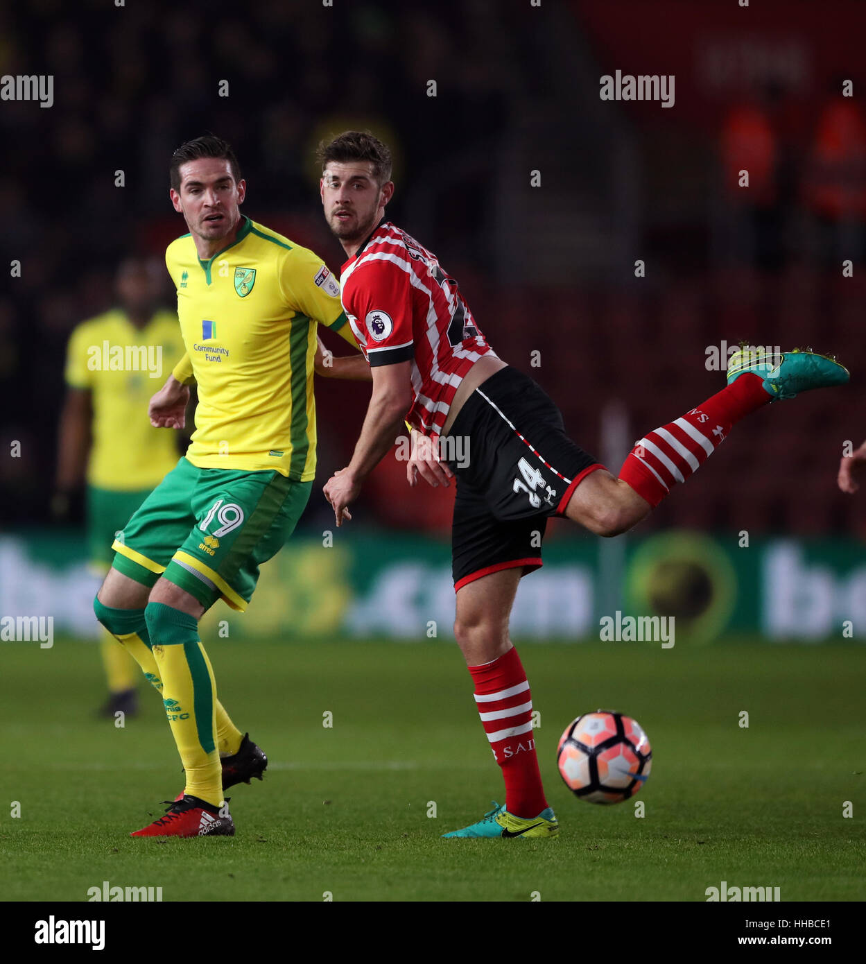 Norwich City's Kyle Lafferty (left) and Southampton's Jack Stephens ...