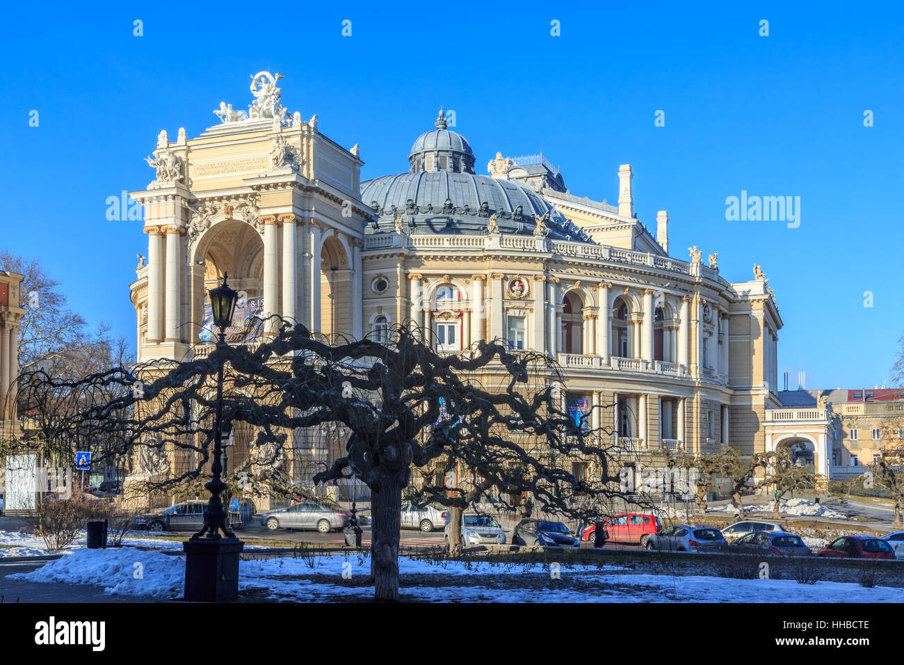 Historic odessa opera house with lamp and tree in winter Stock Photo ...