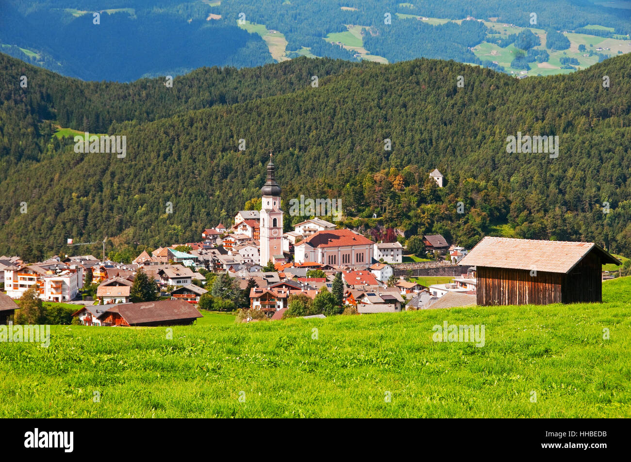 The town of Castelrotto (Kastelruth) nestled in the valley, northern ...