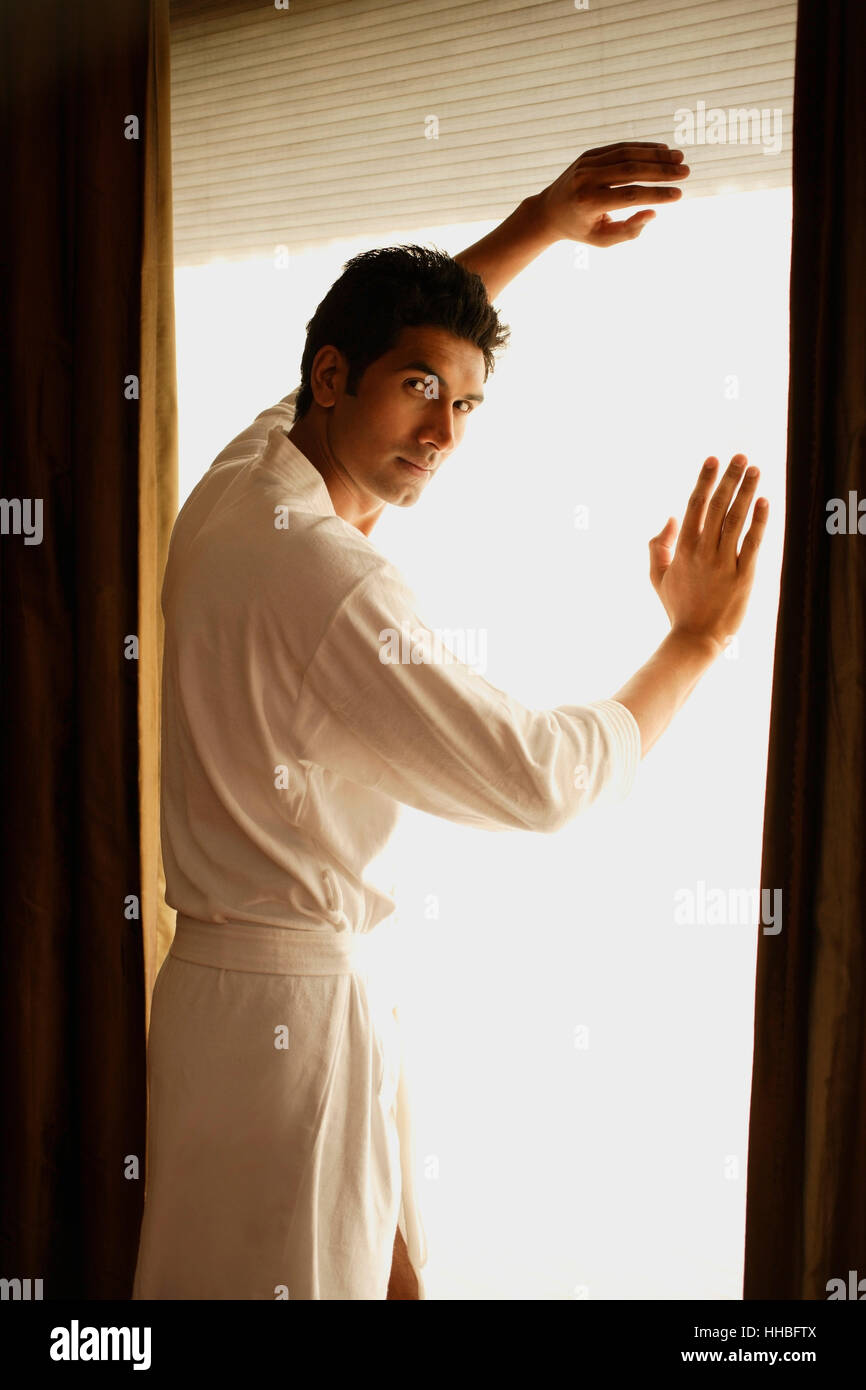 man at window Stock Photo - Alamy