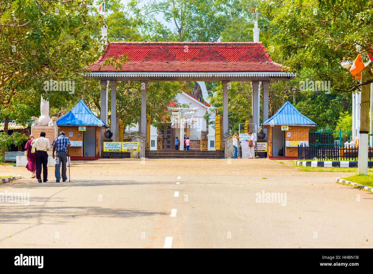 Paved street leading to entrance gate of Sri Maha Bodhi, home to sacred ...
