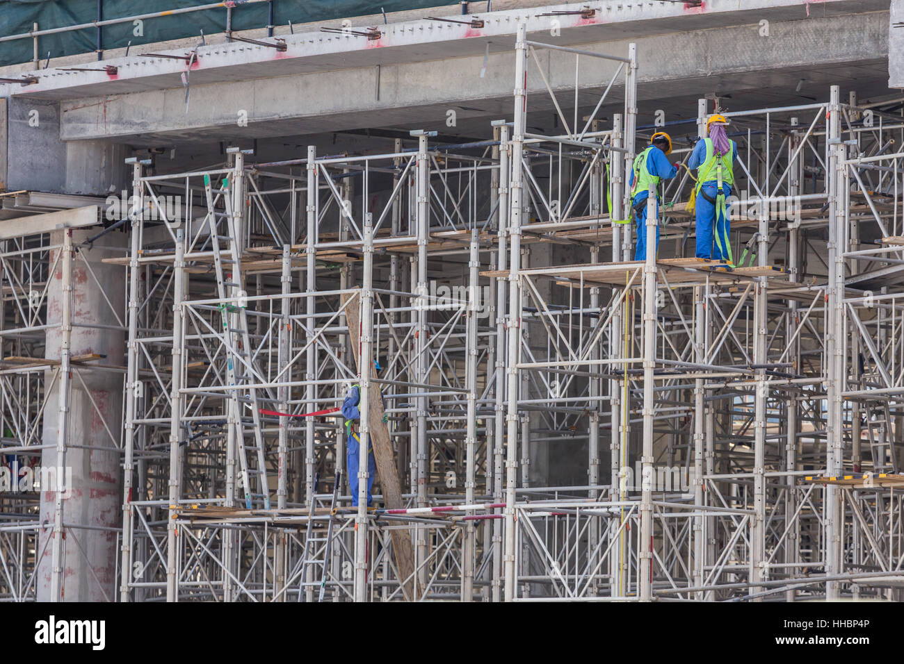 Team of construction worker on construction site Stock Photo - Alamy