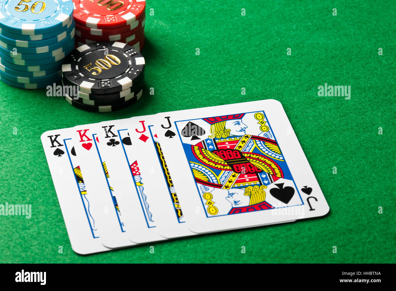 full house in poker game Stock Photo - Alamy