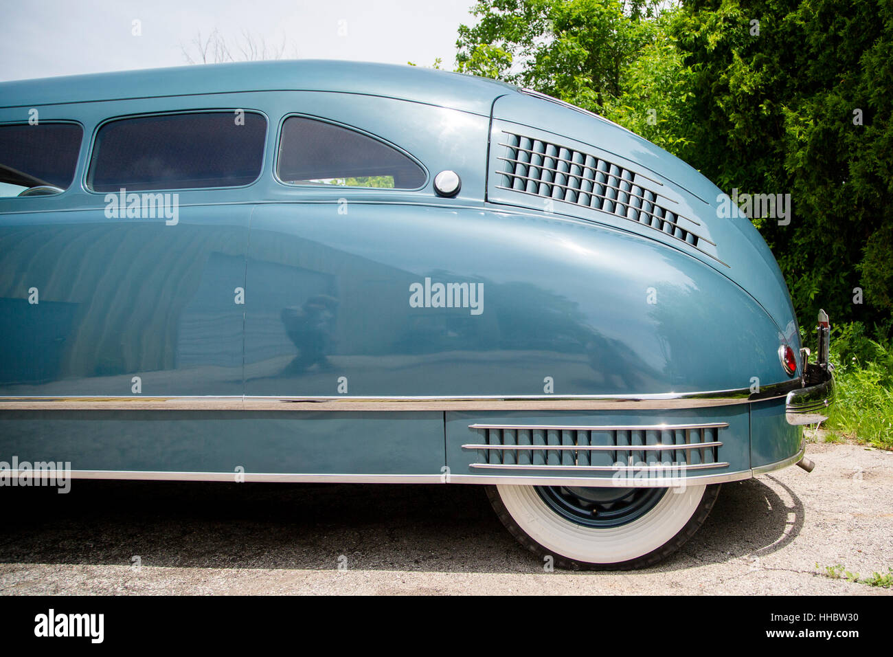 A detail of the back end of a 1936 Scarab minivan automobile, designed ...