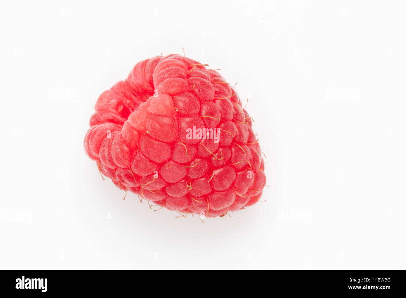 Raspberry against a white background Stock Photo - Alamy