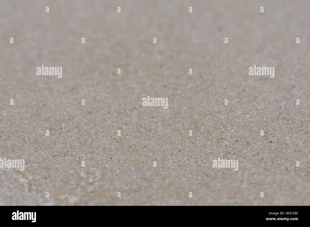 Narrow Focus of Wet Sand Beach vacation background Stock Photo - Alamy