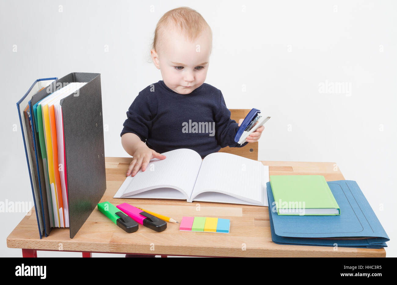 young child at writing desk Stock Photo - Alamy