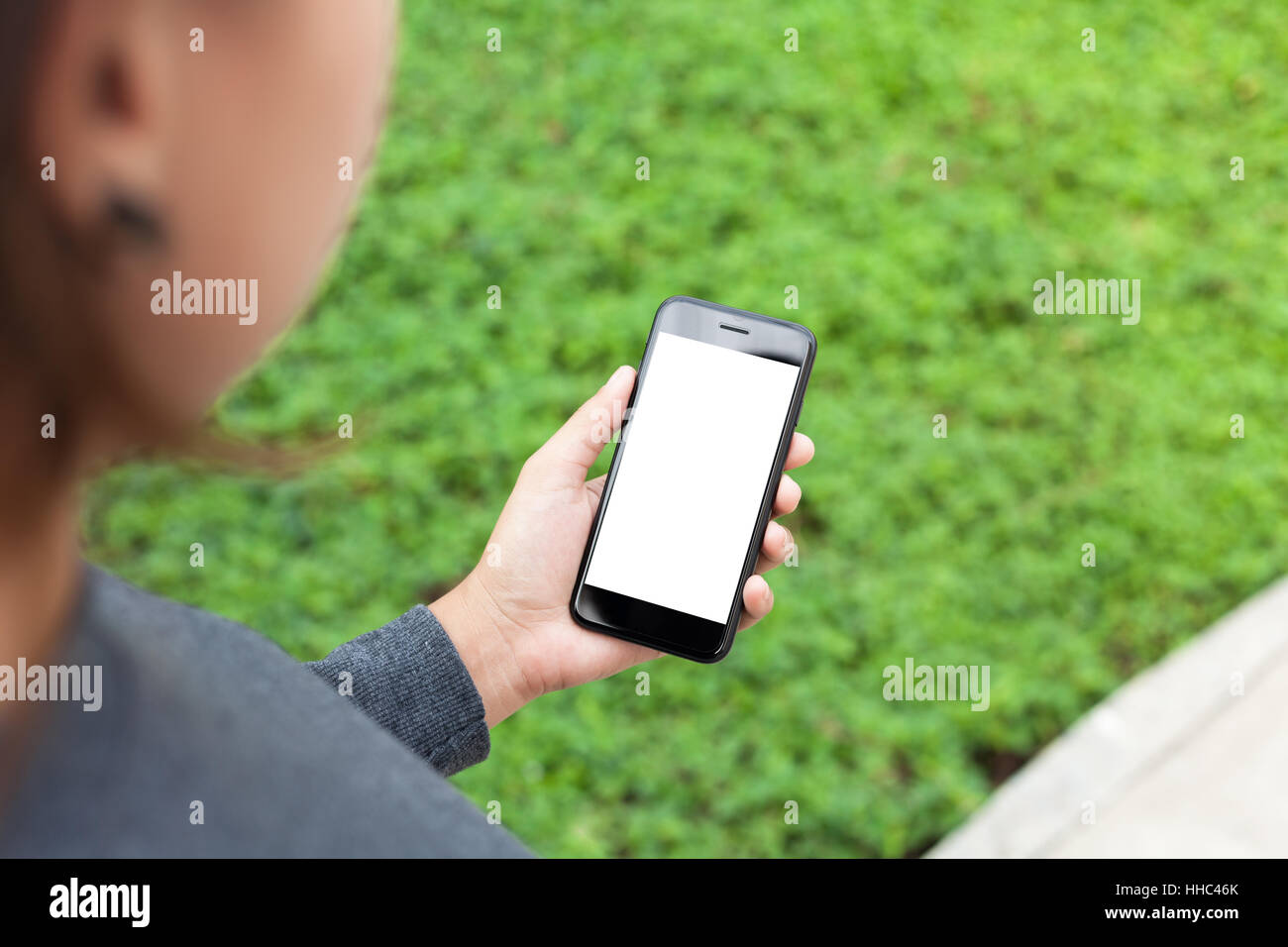 woman hold phone mobile showing blank screen outdoor lifestyle, third ...