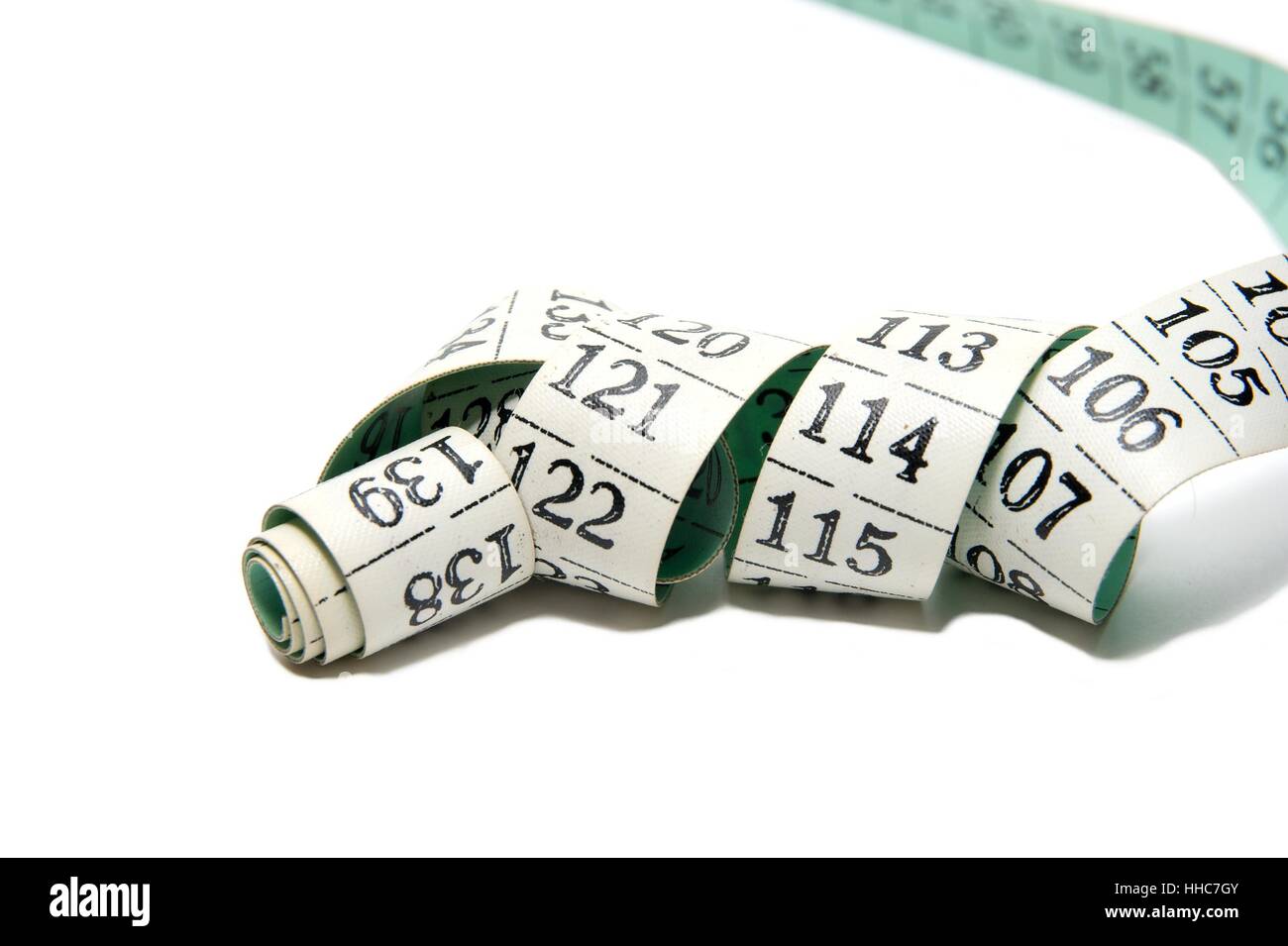 Simple measure tape isolated on white background Stock Photo - Alamy