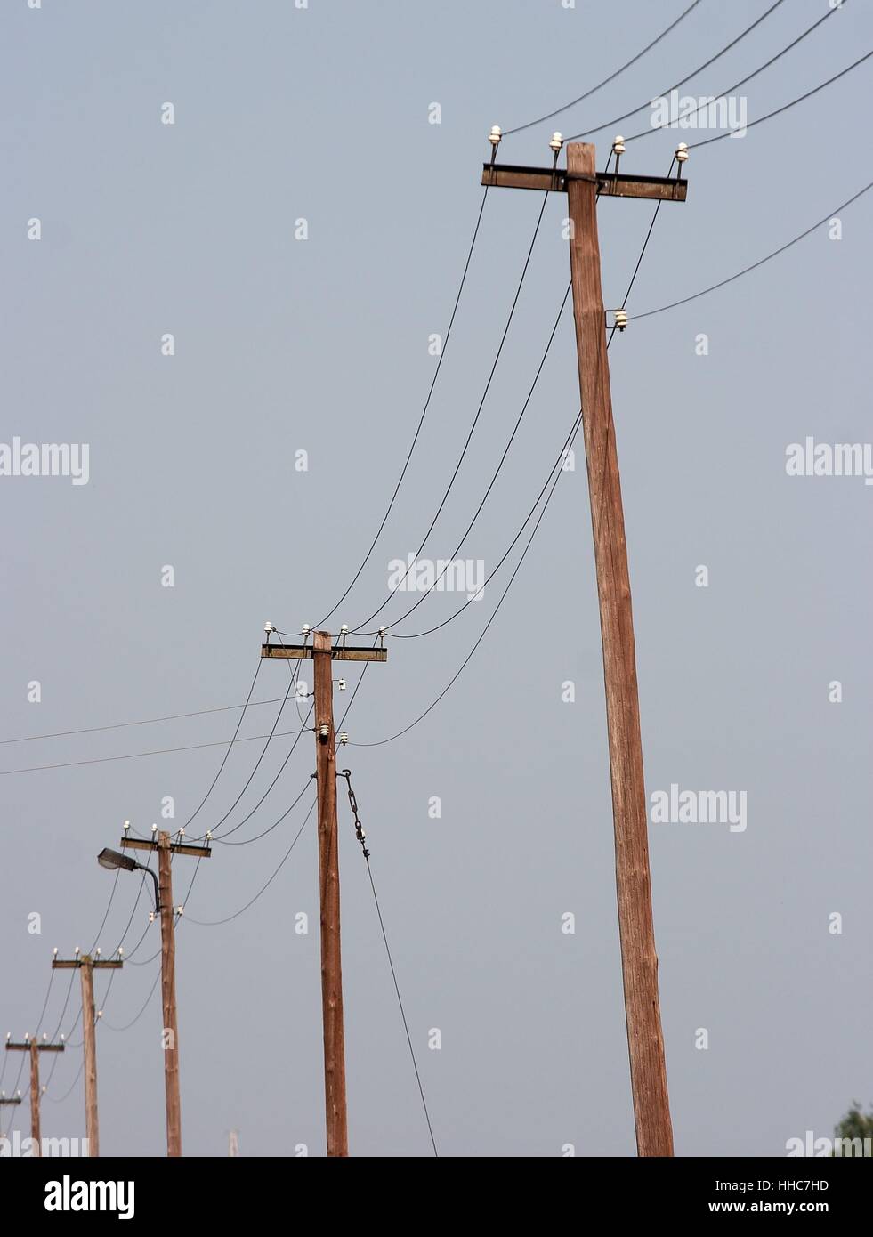 Wooden electric poles Stock Photo - Alamy
