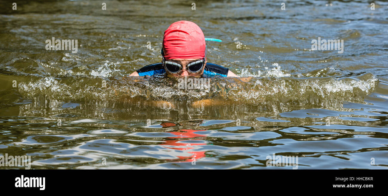 Aquatic sport contest triathon float hi-res stock photography and ...