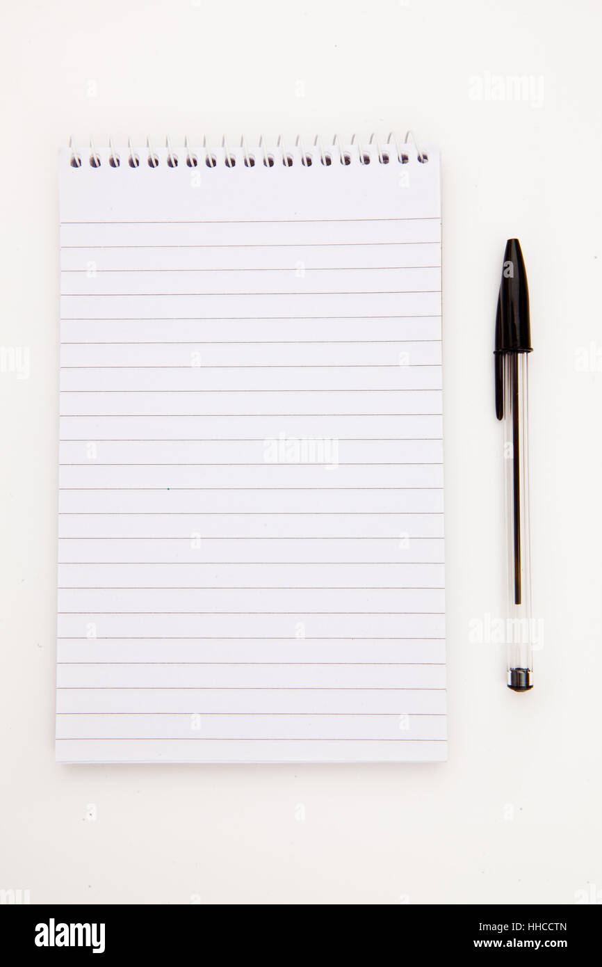 Notepad with black pen sheet against a white background Stock Photo - Alamy