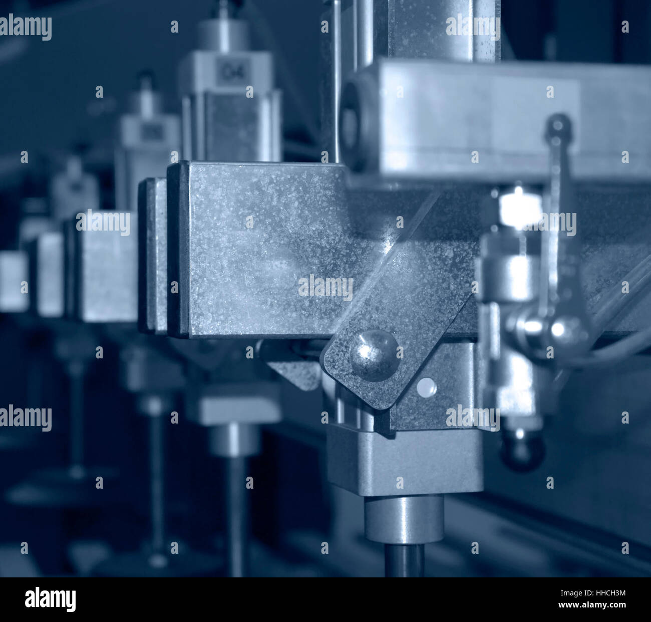 industrial theme showing a blue toned machine detail Stock Photo - Alamy