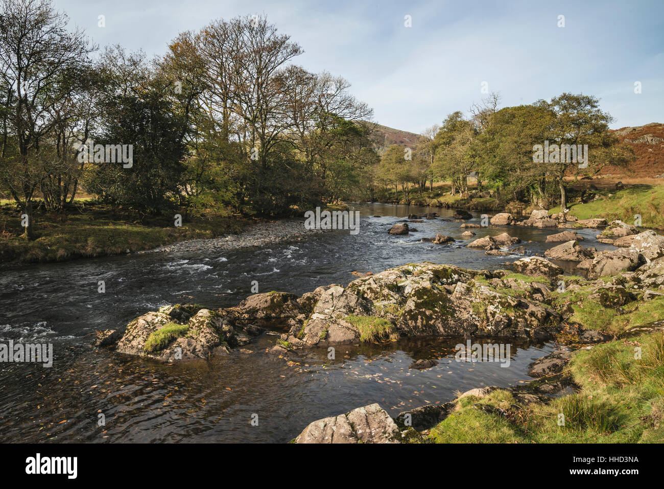 Beautiful Autumn Fall landscape image of river stream in Lake District ...
