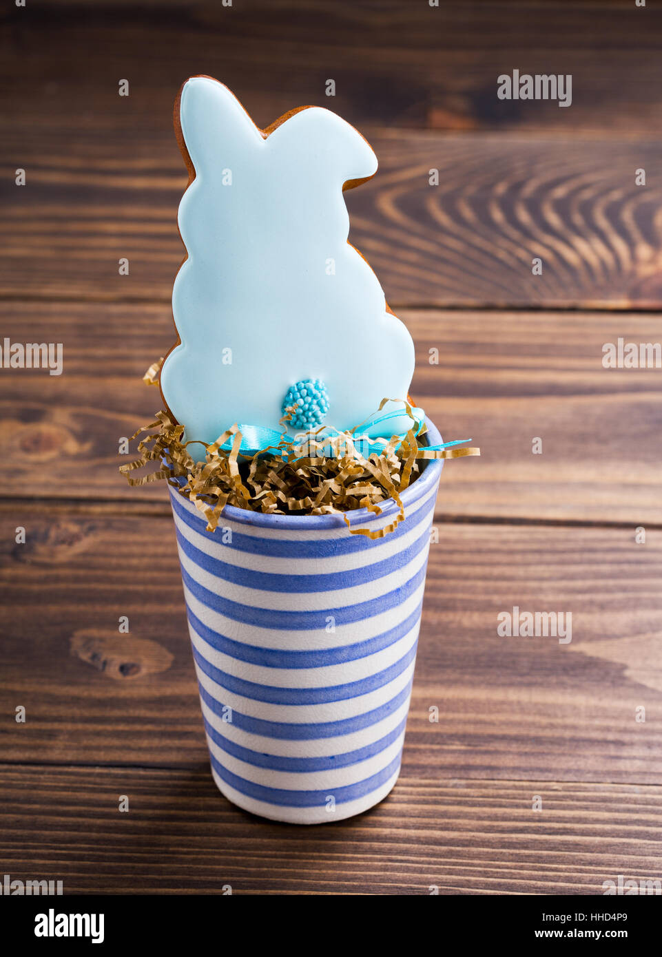 Gingerbread easter rabbit coated with light blue icing Stock Photo - Alamy