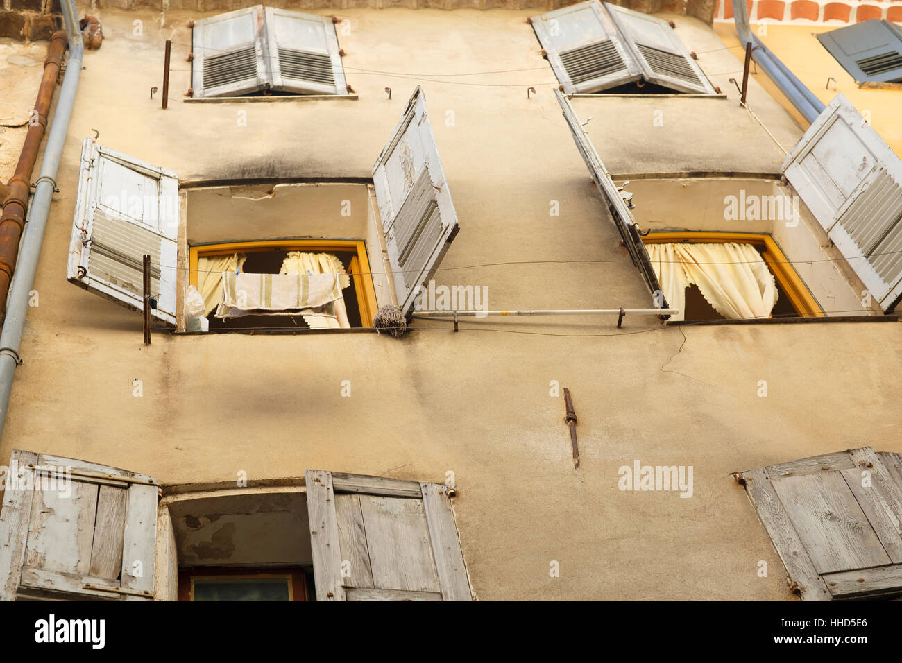 Typical facade with windows and shutters, typical alley, Grasse; Alpes ...