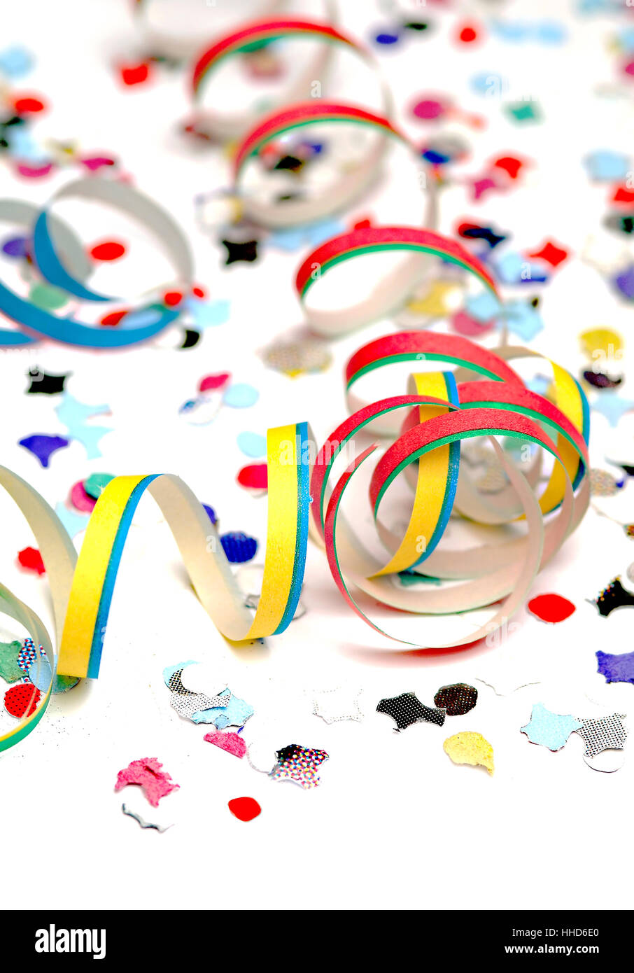 Colorful streamers on white background Stock Photo - Alamy