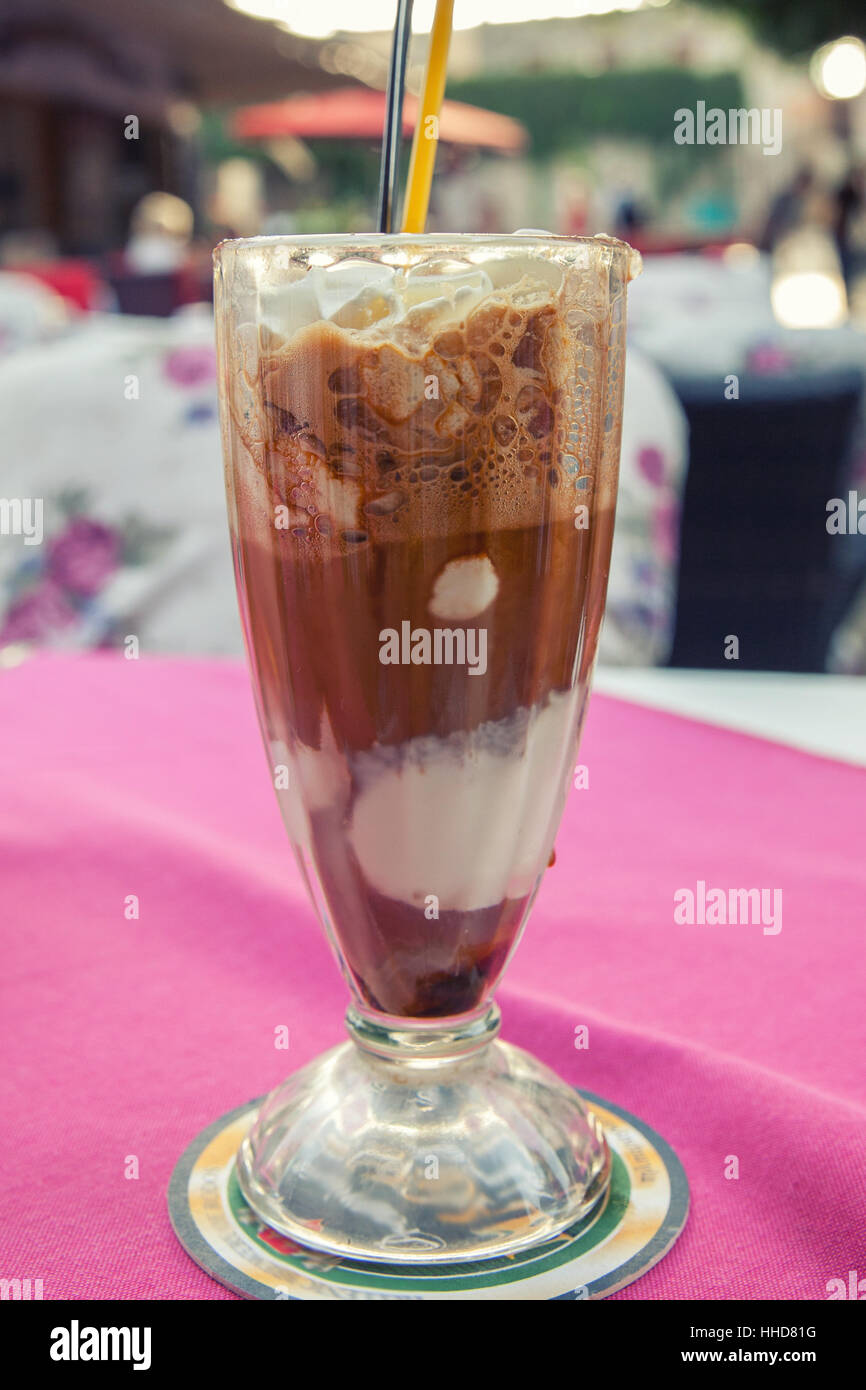 iced coffee frappe with ice cream on table in outdoor street cafe Stock ...