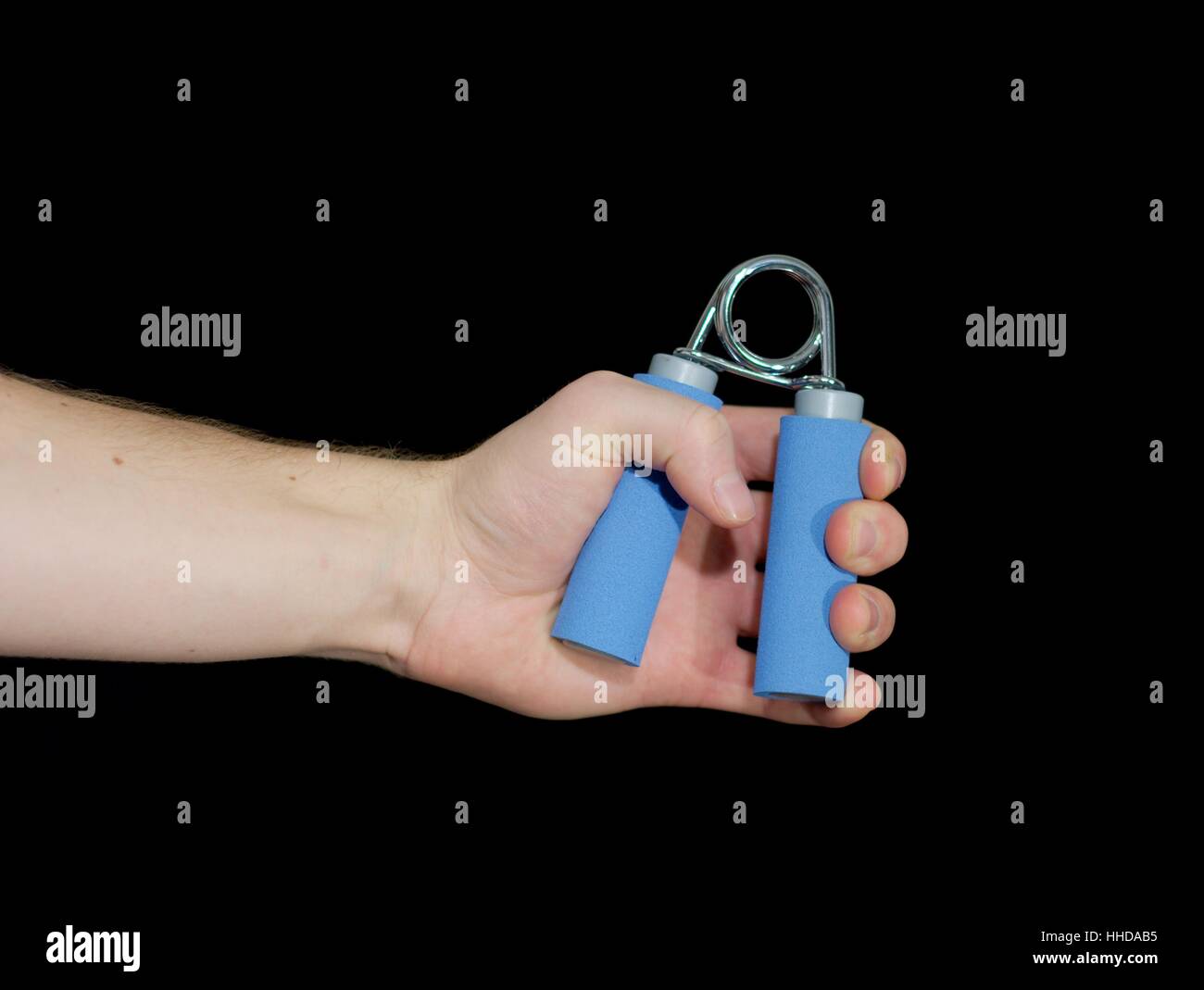 A pair of wrist trainer instruments in a hand Stock Photo - Alamy