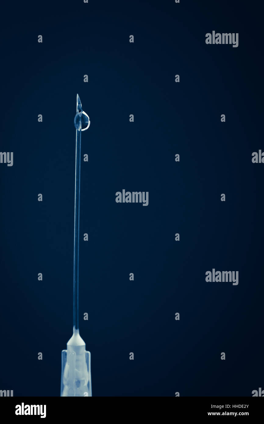 Drop outgoing of a surgical needle in negative Stock Photo - Alamy