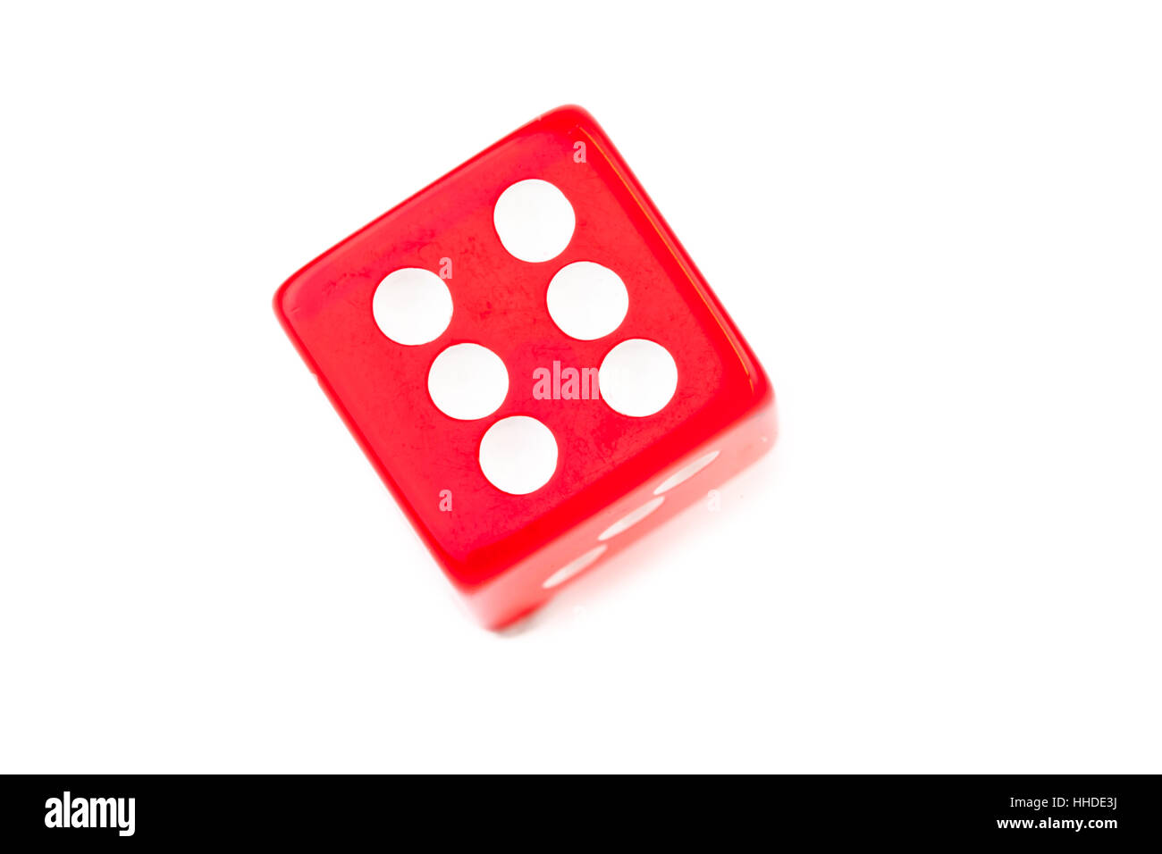 Red dice against a white background Stock Photo - Alamy