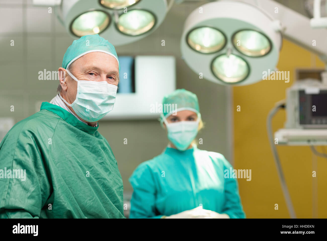 Man in surgical gown green hi-res stock photography and images - Alamy