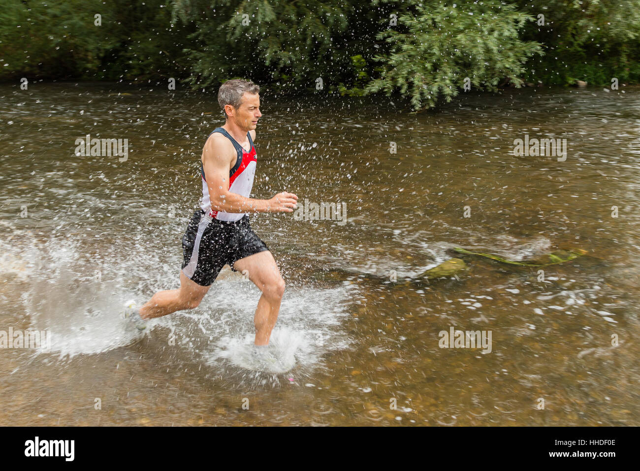 Man runs trail through hi-res stock photography and images - Alamy