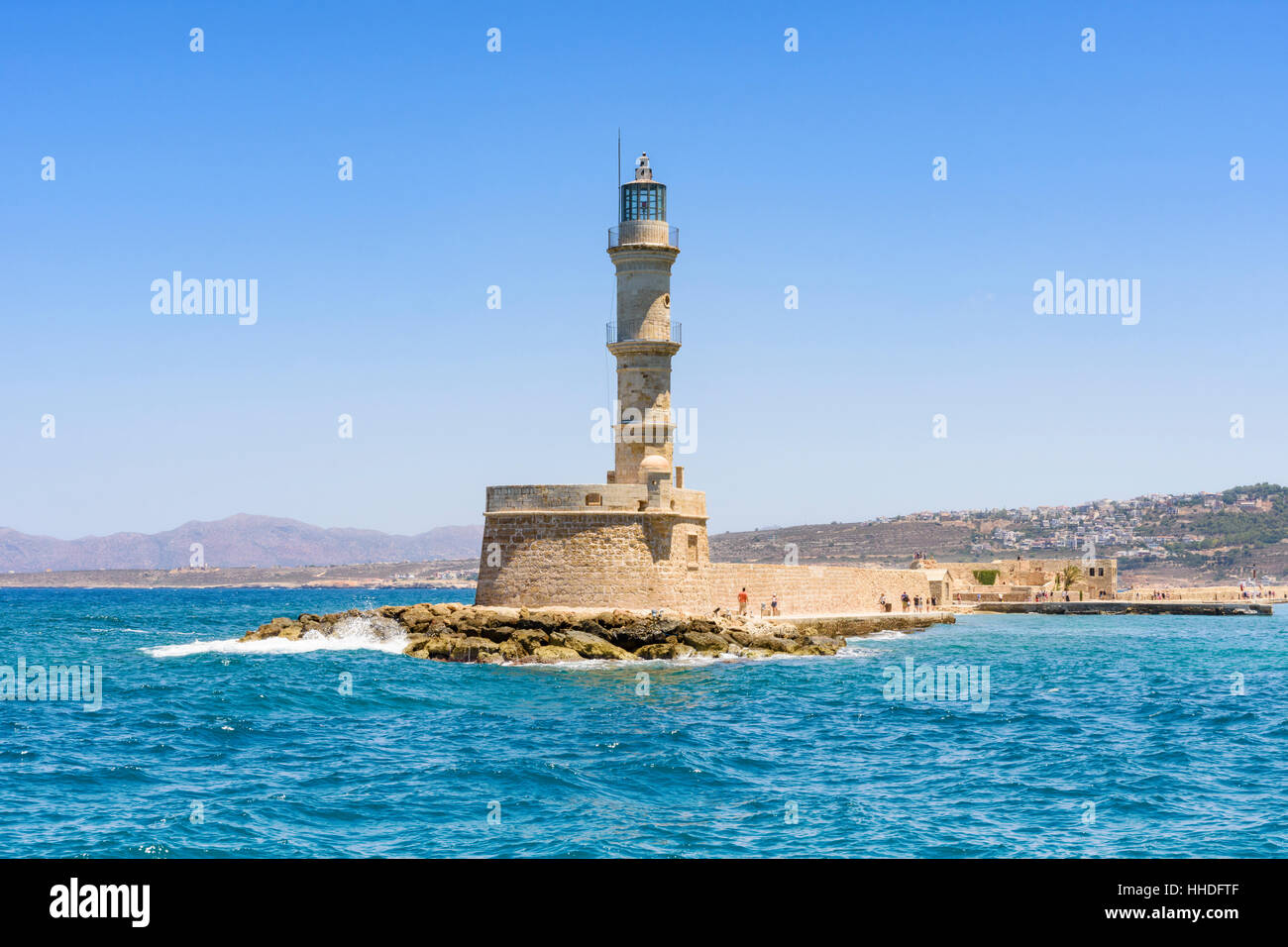 The Chania lighthouse at the entrance to the Venetian harbour of Chania ...