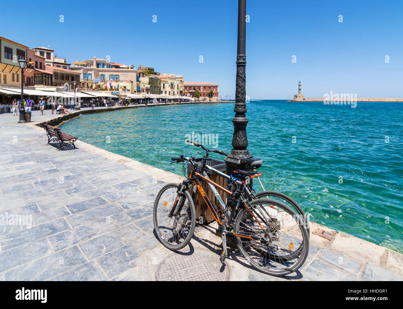 Bikes on the waterfront promenade around the old outer Venetian harbour ...