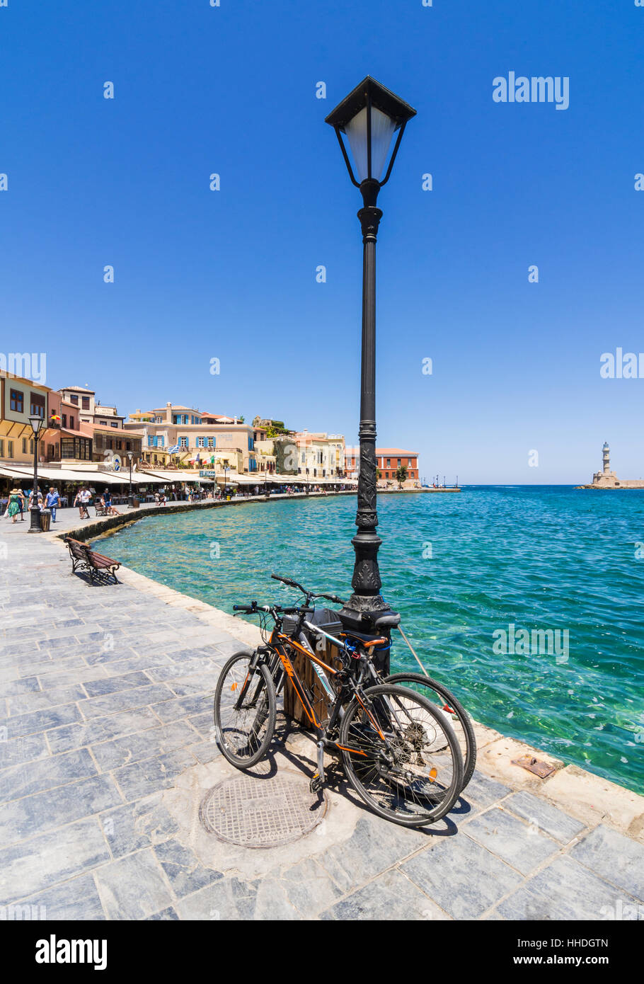 Bikes on the waterfront promenade around the old outer Venetian harbour ...