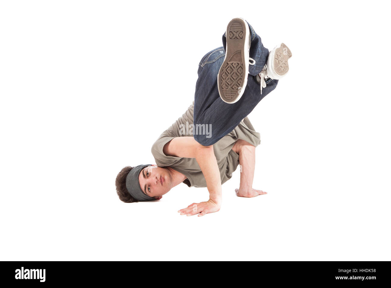 photo of dancer performing moves on the floor on white background Stock ...