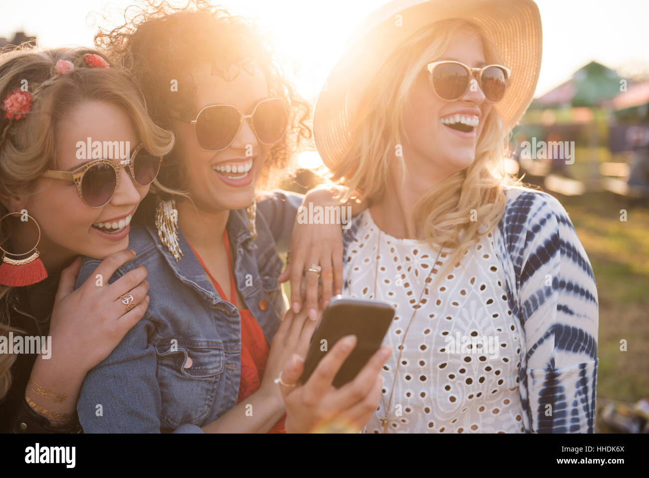 Enjoying time with friends outdoors Stock Photo - Alamy
