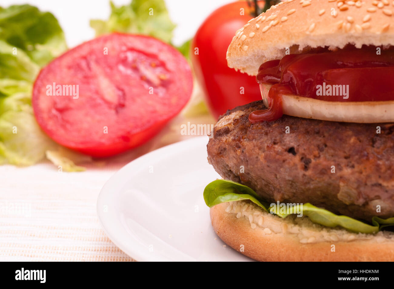 ketchup on a hamburger Stock Photo - Alamy