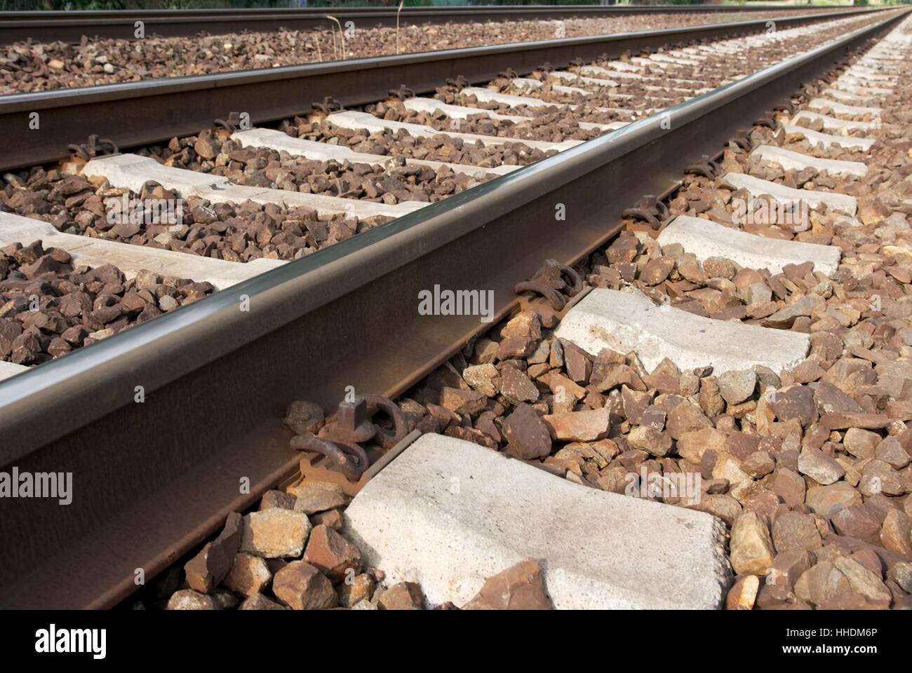 Straight railway tracks close up Stock Photo - Alamy