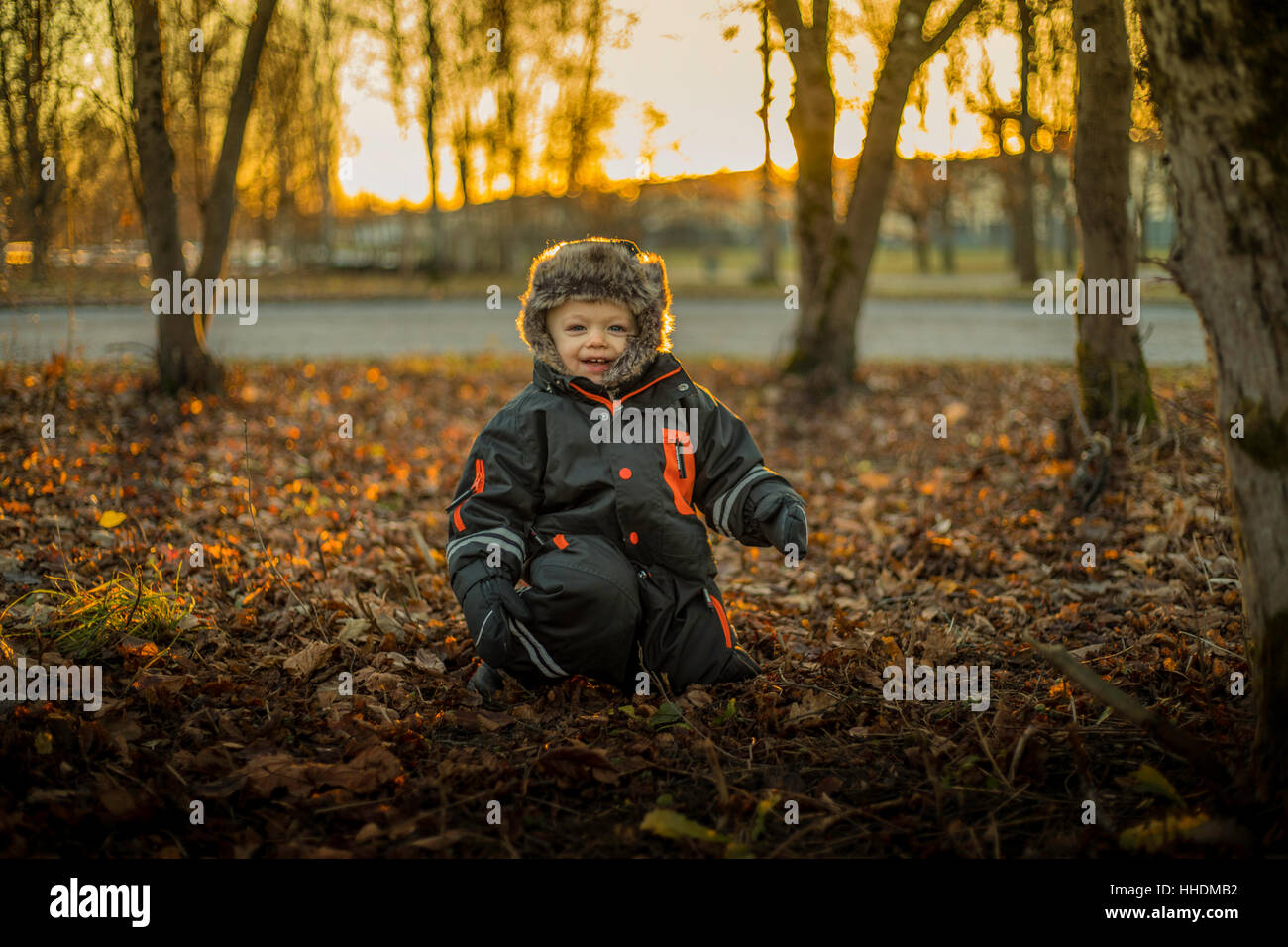 Kid in sunset Stock Photo - Alamy