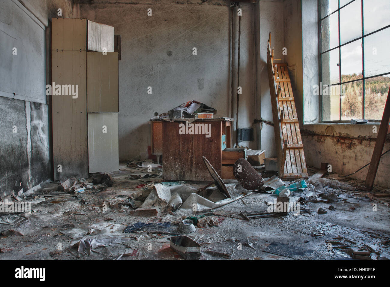 Photo from demolition textile factory,broken table Stock Photo - Alamy
