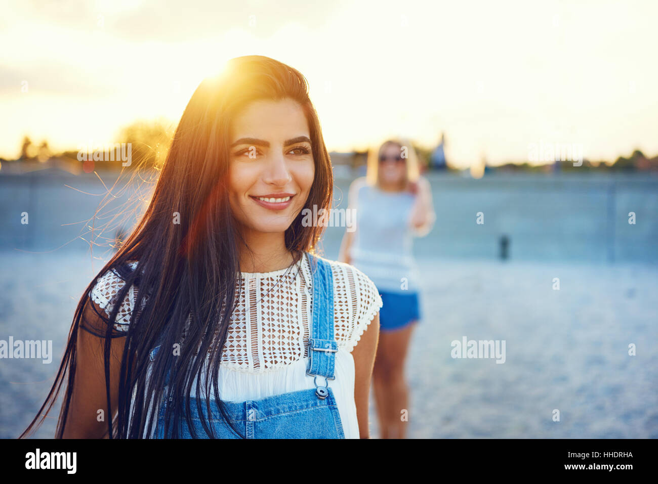 Beautiful female student friends behind hi-res stock photography and ...