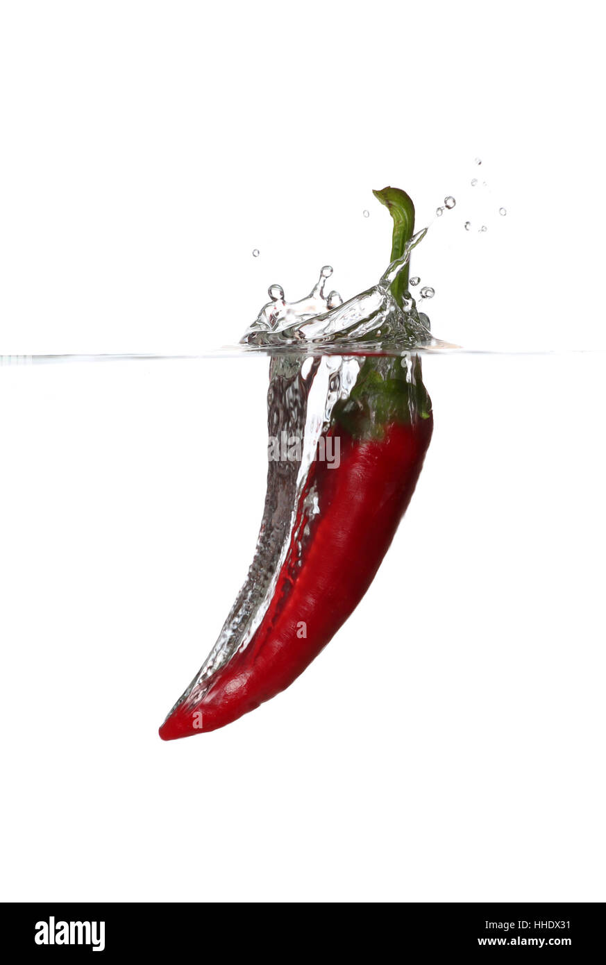 Red chili falling in water hi-res stock photography and images - Alamy