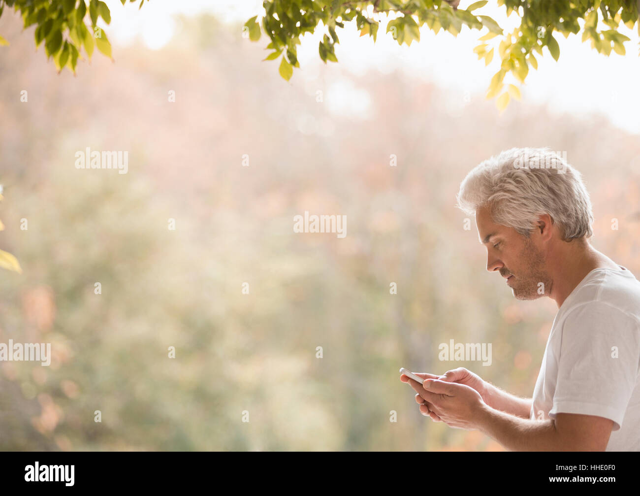 One man texting on mobile hi-res stock photography and images - Alamy