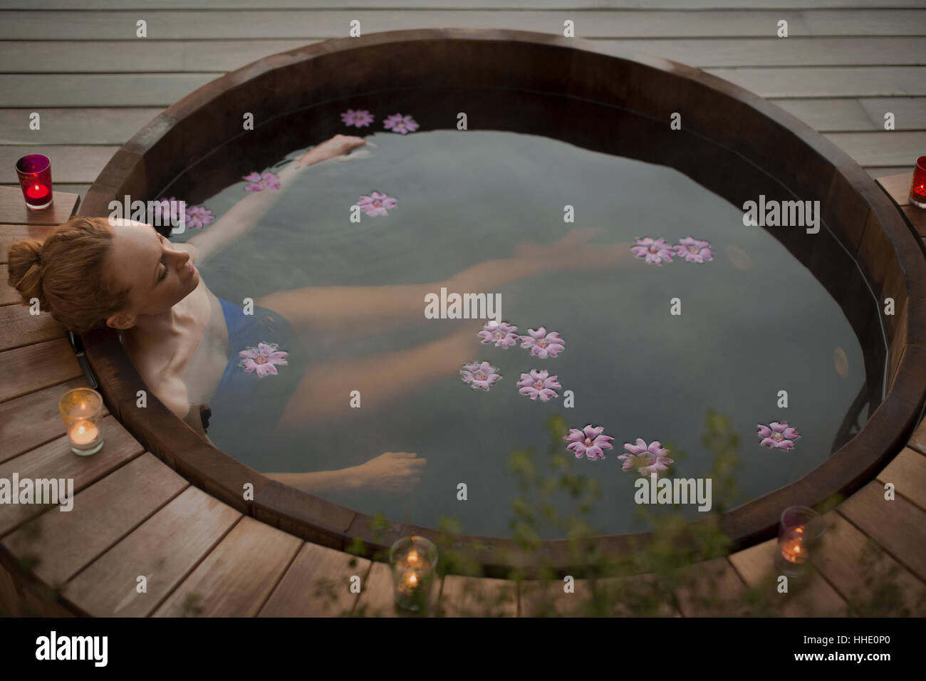 Woman jacuzzi flowers hi-res stock photography and images - Alamy