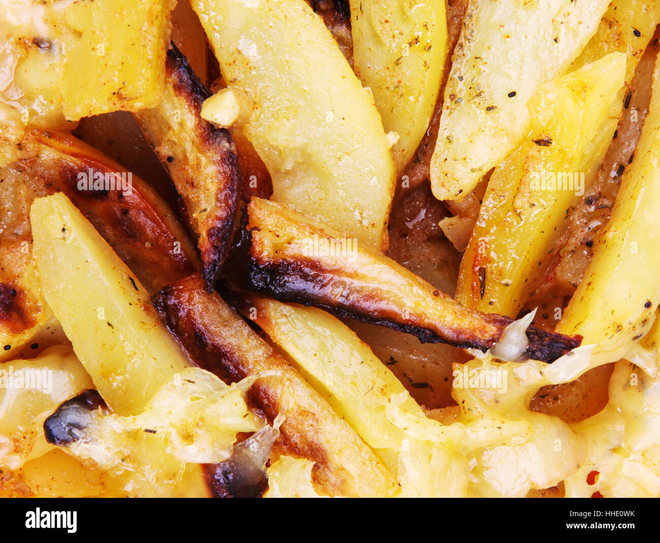 Roasted potatoes background Stock Photo - Alamy